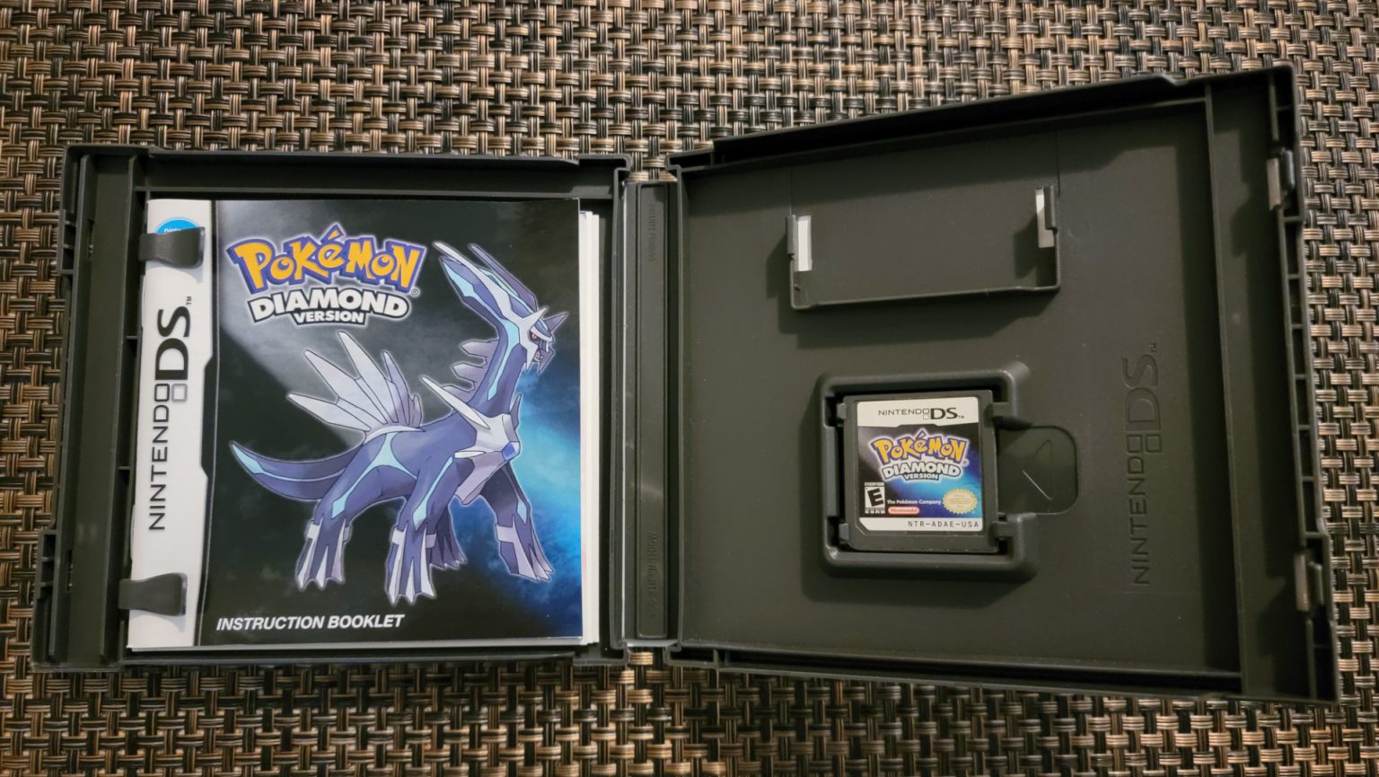 A comparison of the Pokémon Diamond DS game box and cart with Pokémon ...